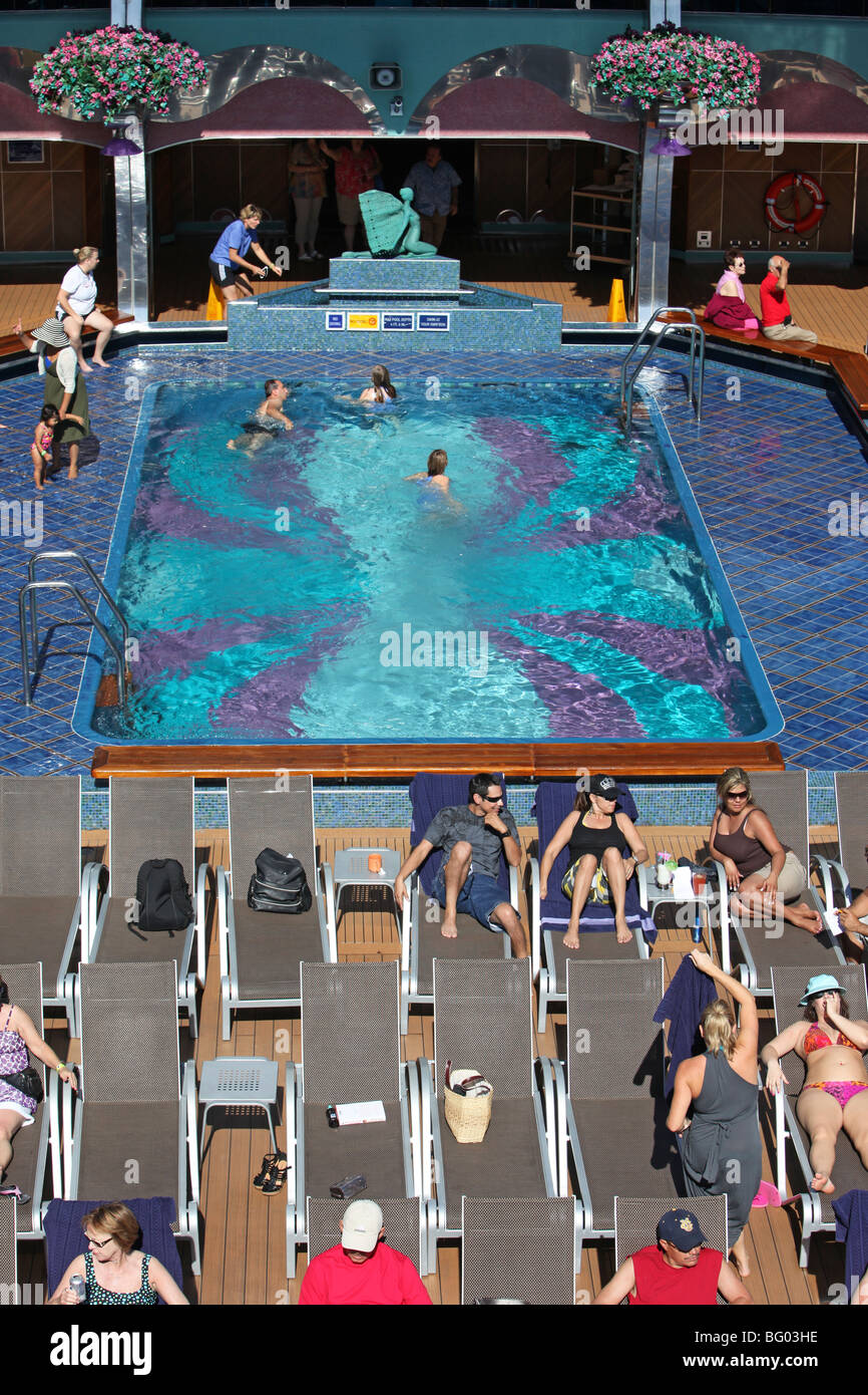 Cruise ship main deck swimming pool with family. Passengers on vacation ...