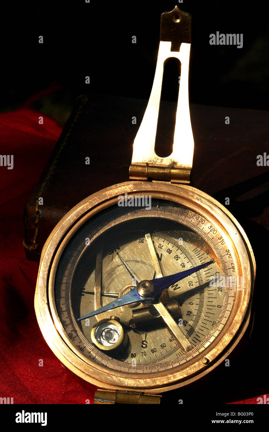 A Brass Compass used for surveying and Navigation Stock Photo - Alamy