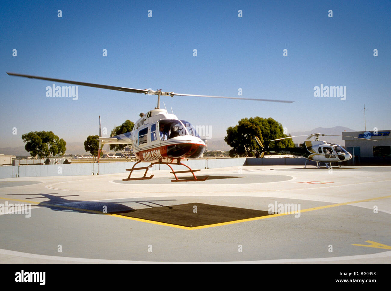 rotor blade lift flight jet ranger pad land take off Stock Photo - Alamy