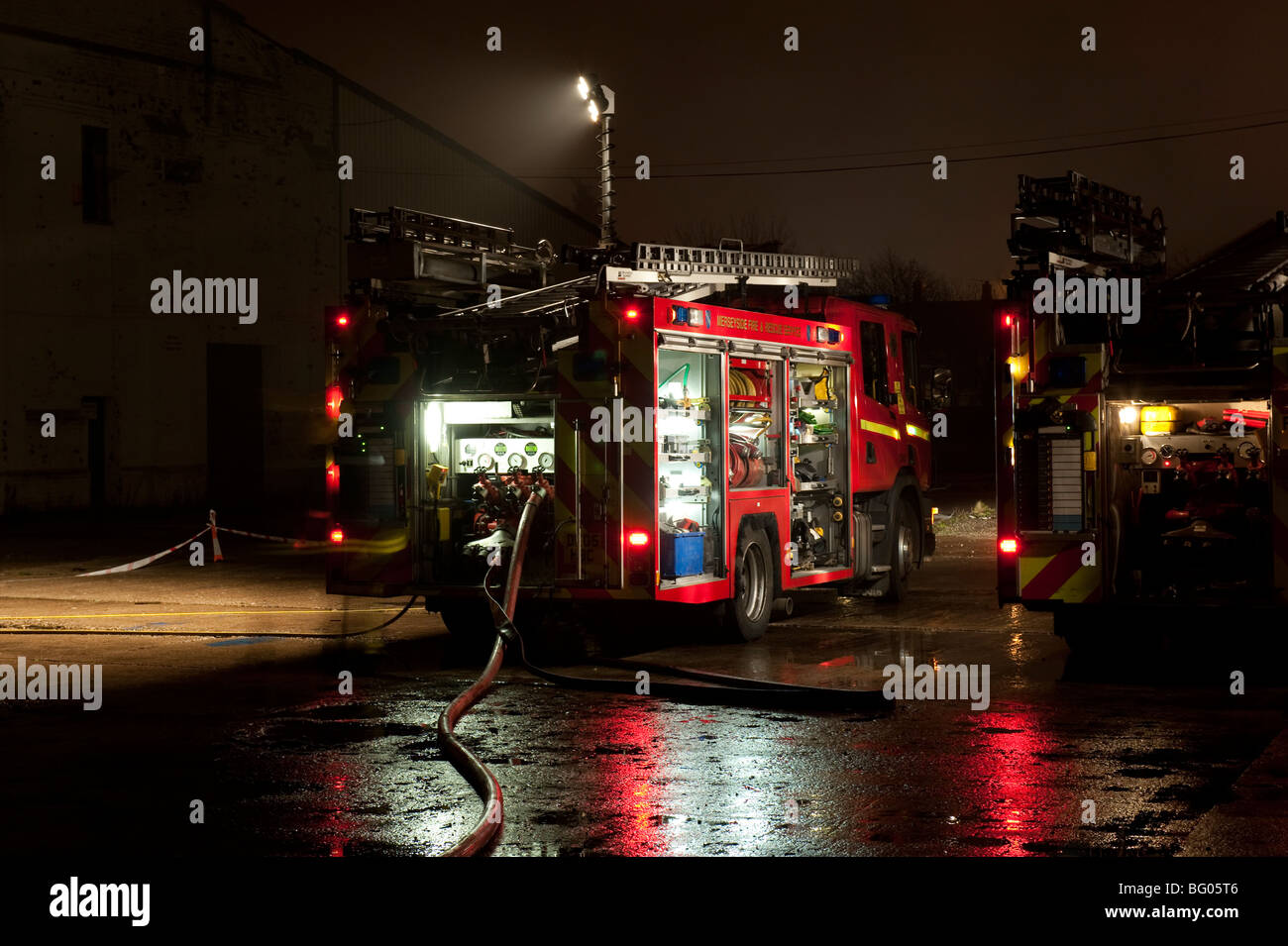 fire engine at night with reflections of lights Stock Photo - Alamy