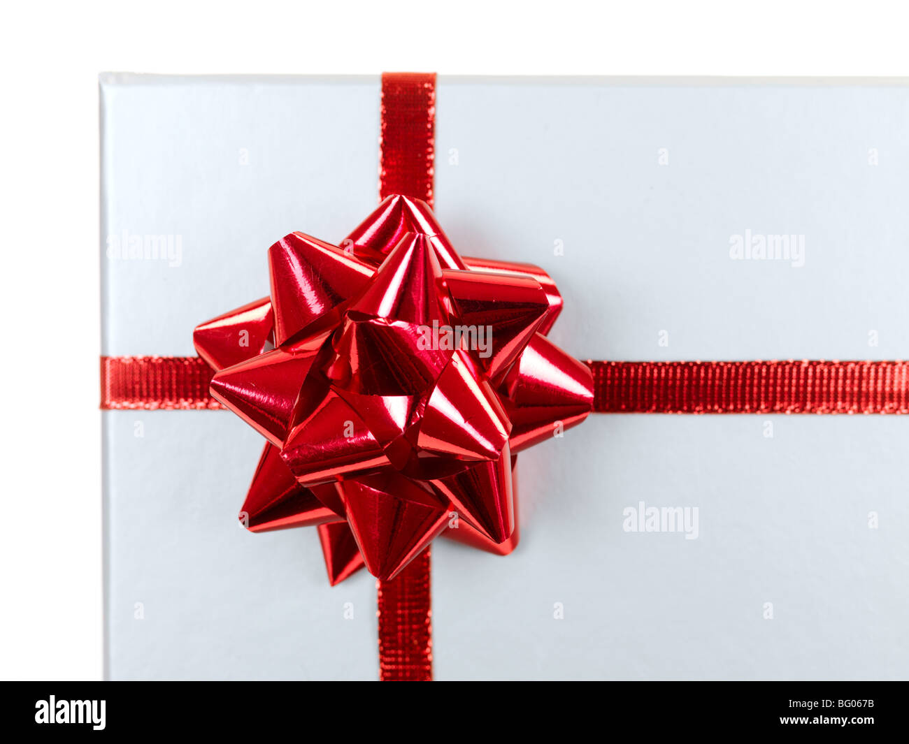 A Christmas present isolated against a white background Stock Photo - Alamy