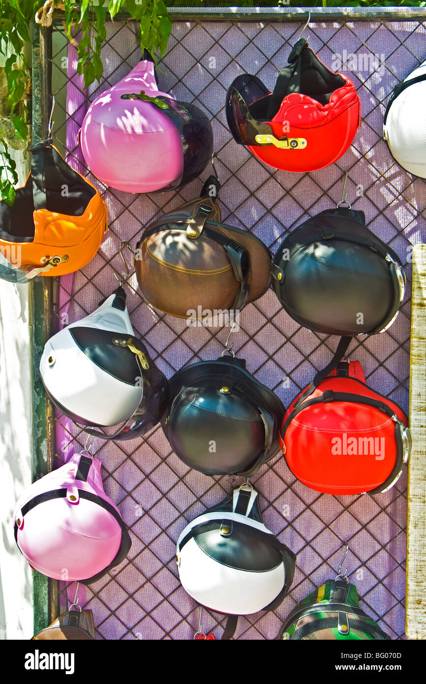 'Designer' crash helmets on stall at 'Hippie Market' Sant Carles ...