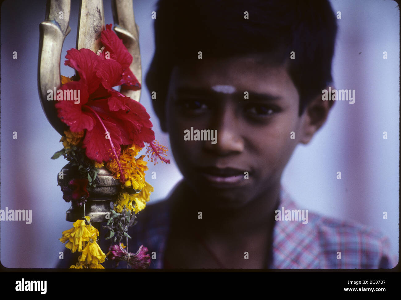 Portrait of young Hindu boy with trident, Madurai, India Stock Photo ...