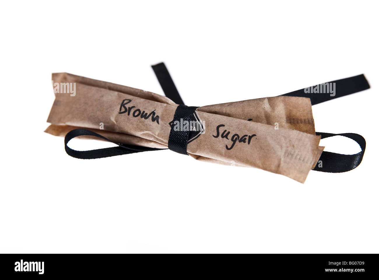 brown cane sugar portion Stock Photo - Alamy