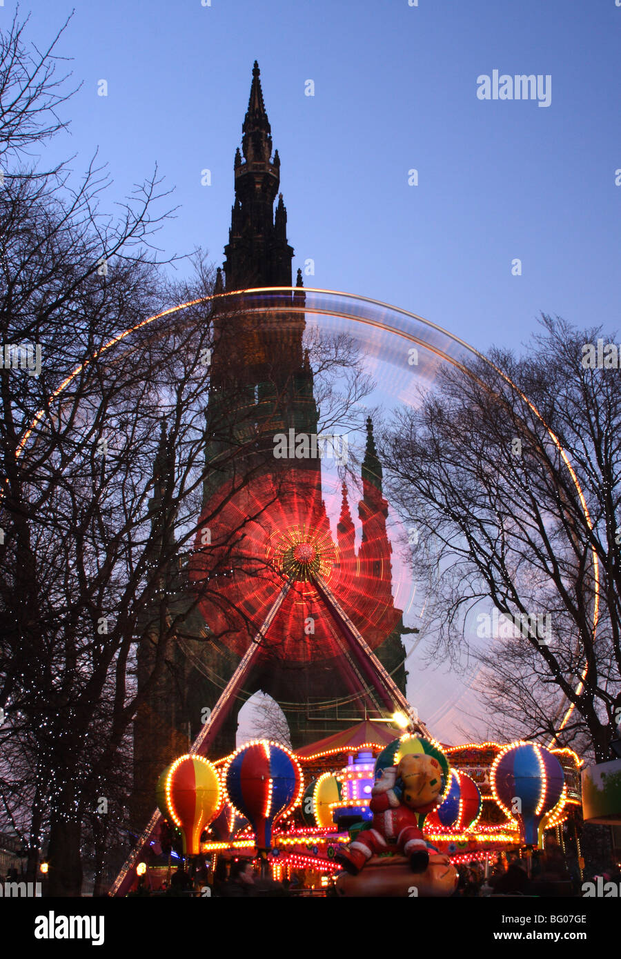 Ferris Wheel in front of Walter Scott Monument, Edinburgh, Scotland ...