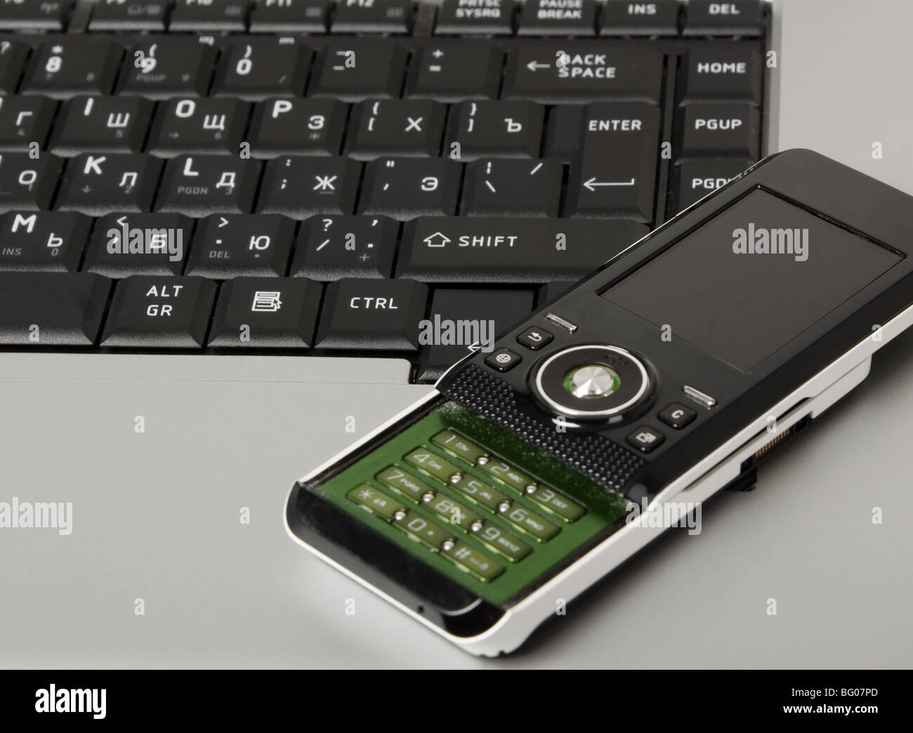 Computer and mobile phone Stock Photo - Alamy