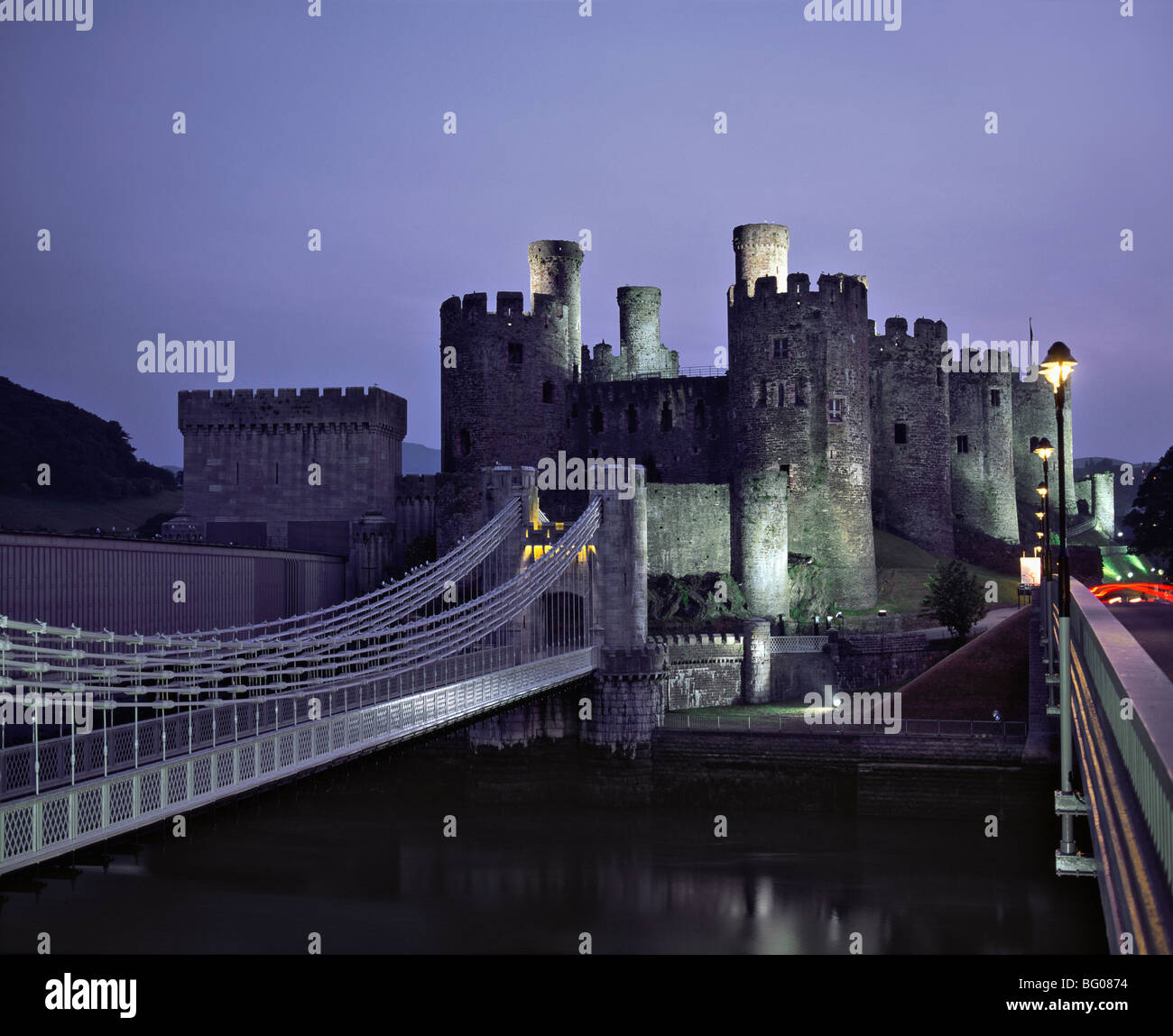 Telford Suspension Bridge at dusk, crossing the River Conwy, leading to ...