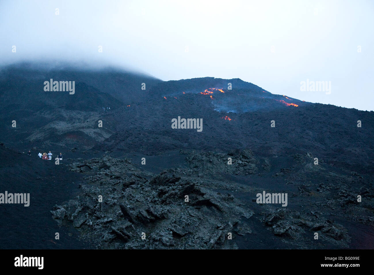 Flowing Lava and Tourists towards the Pacaya Volcano Peak. Volcan ...