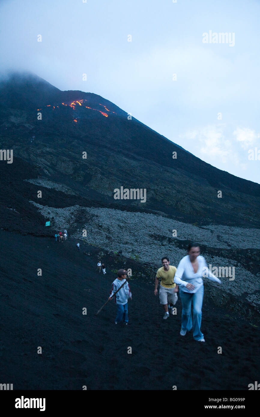 Flowing Lava and Tourists towards the Pacaya Volcano Peak. Volcan ...