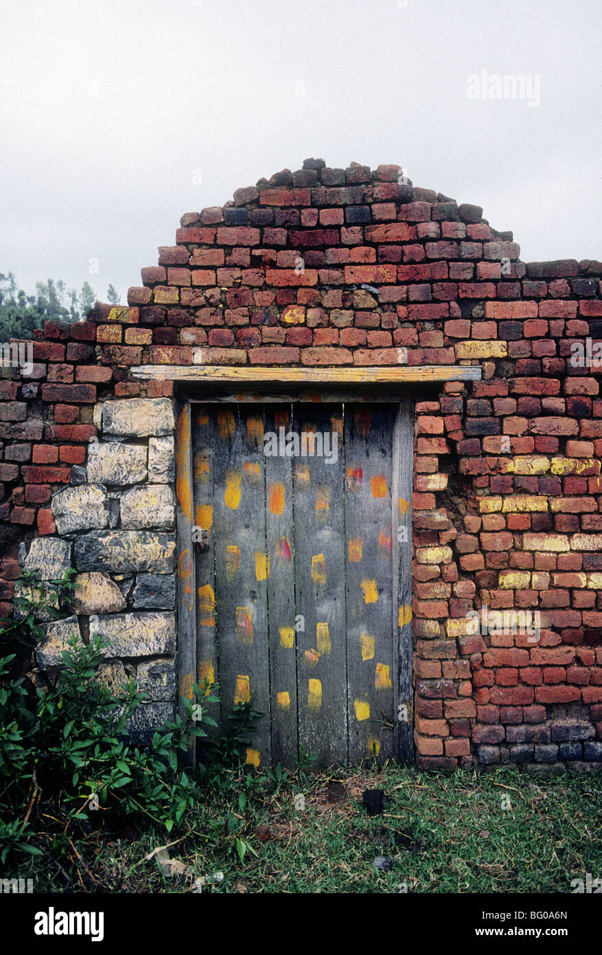 A door and brick wall stand alone near Ooty, India Stock Photo - Alamy