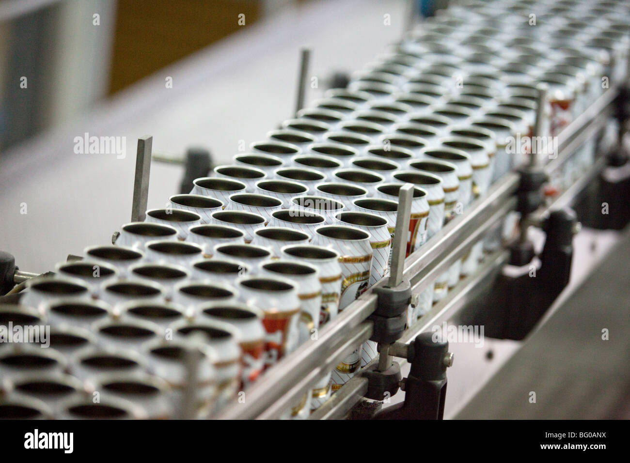 Modern cans filling line in a brewery, Poland Stock Photo - Alamy