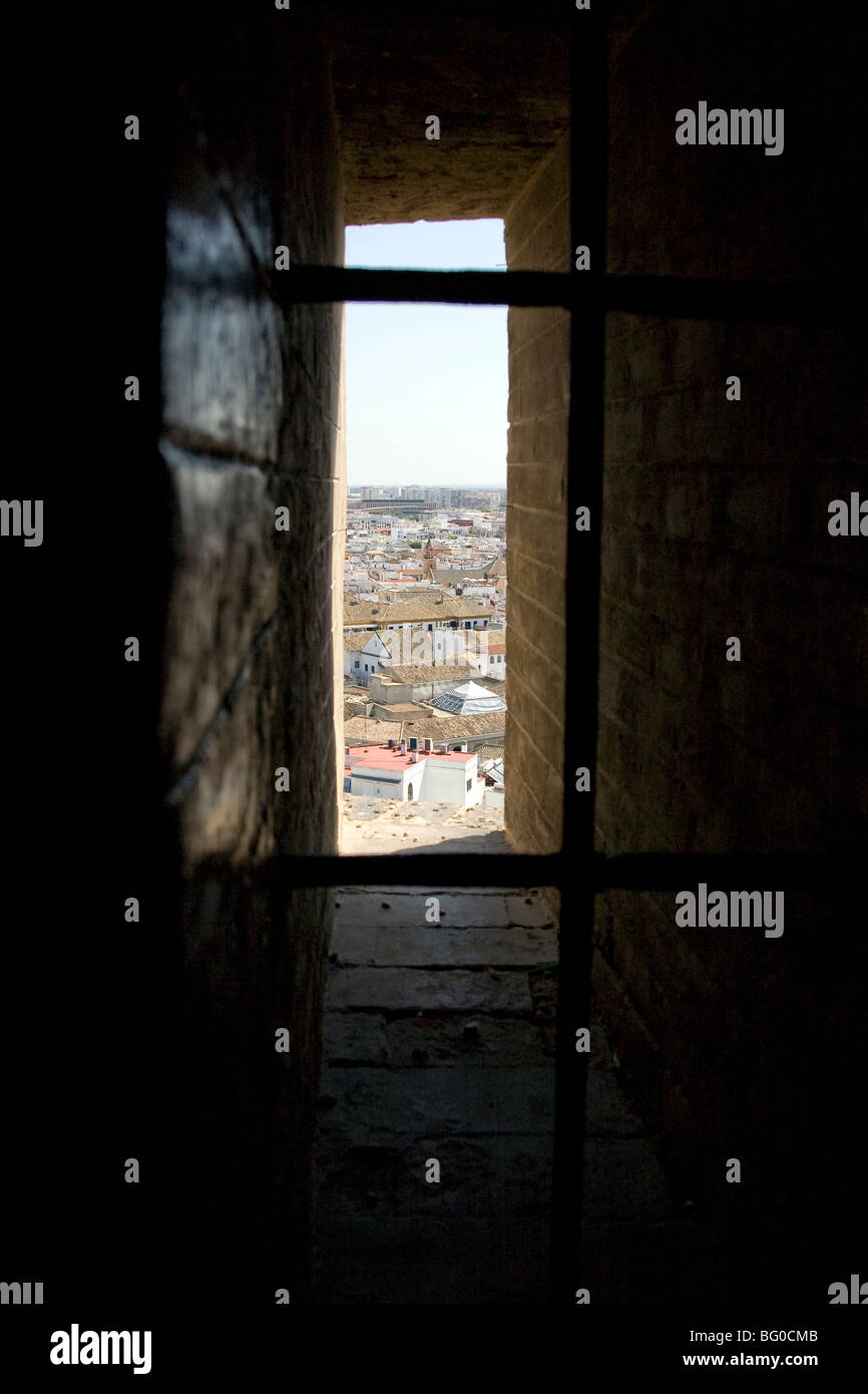 City viewed from a church window, Plaza Del Triunfo, Seville, Spain ...