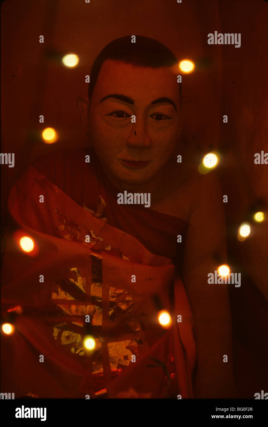 A Buddhist monk replica that looks like the Dalai Lama in a Yangon ...