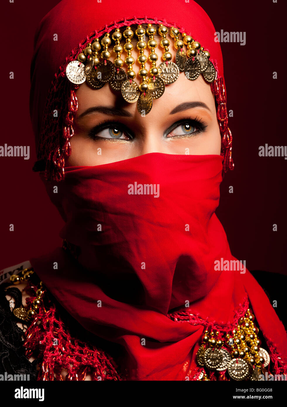 A young beauty wearing a red veil hi-res stock photography and images ...