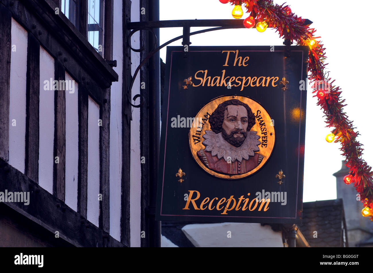 The Shakespeare hotel sign with Christmas lights, Stratford-upon-Avon ...