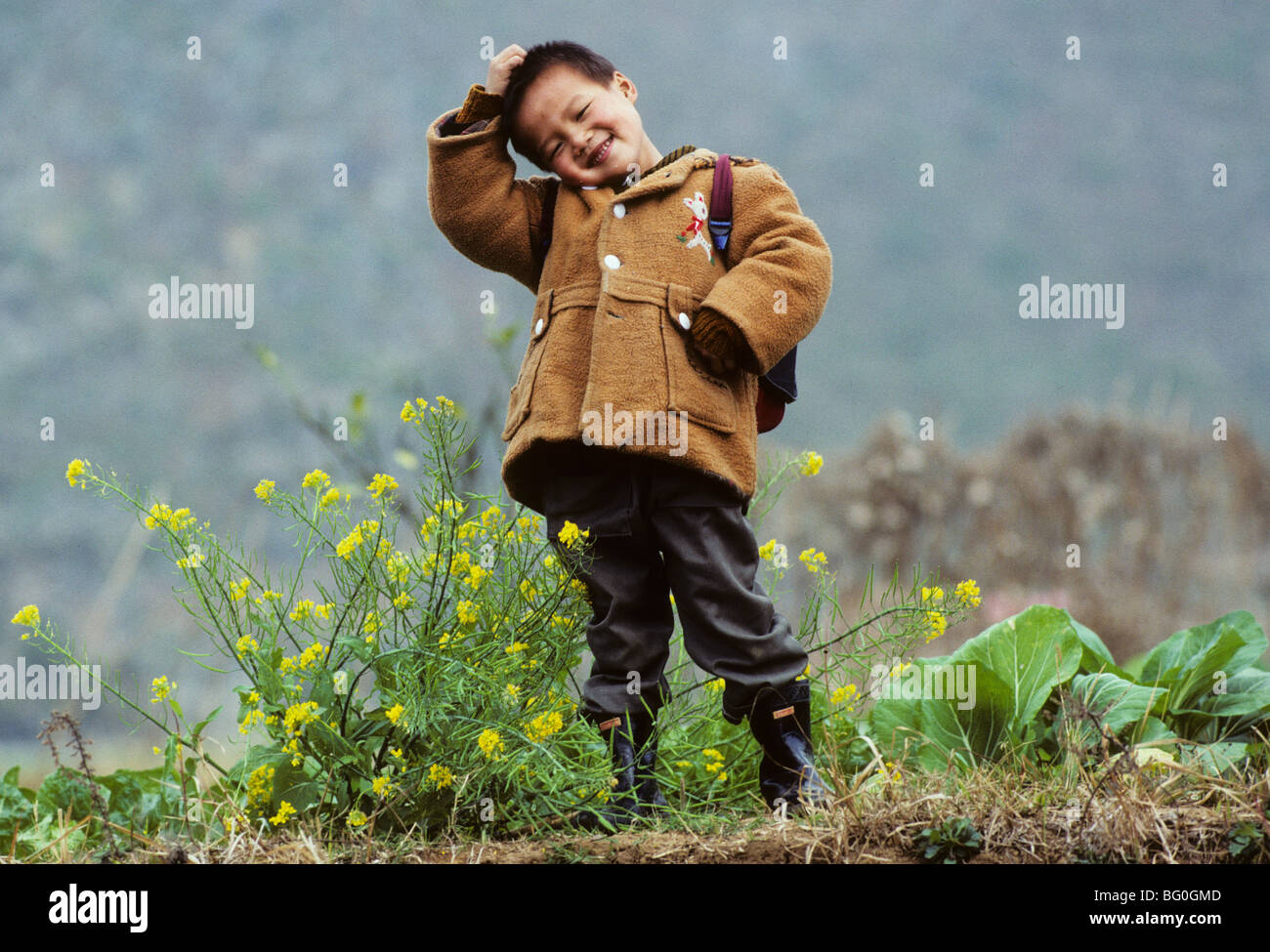 Portrait of young Chinese boy happy and laughing, Yangshuo, China Stock ...