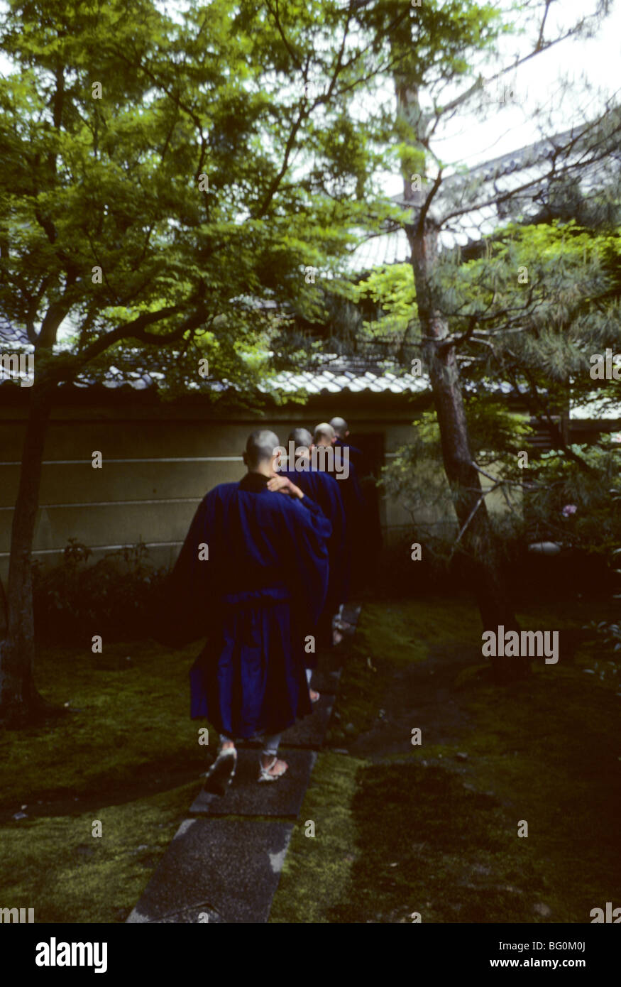 Buddhist monks enter a Temple in Kyoto, Japan Stock Photo - Alamy