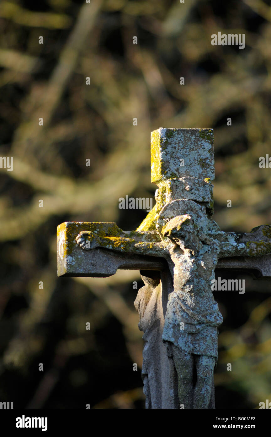 carved statue of christ on gravestone Stock Photo - Alamy