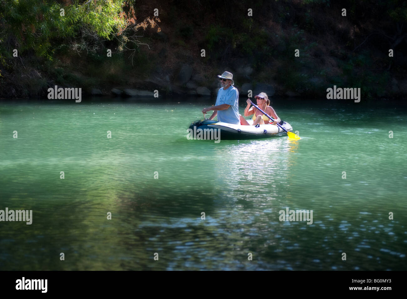 Man woman male female paddle paddling hi-res stock photography and ...