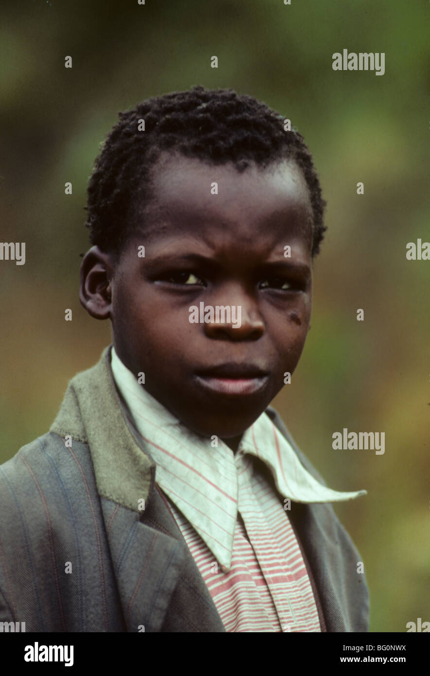 Portrait of young South African Boy with shirt with long collar Stock ...