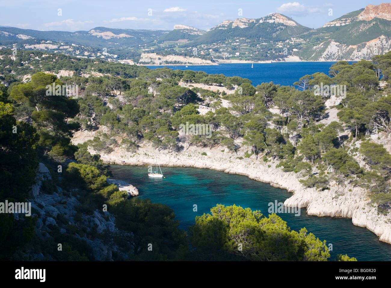 View from hillside to Calanque de Port-Pin and distant Baie de Cassis ...