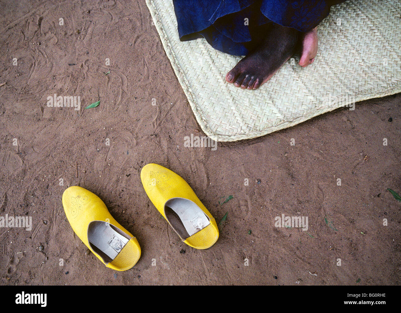 Colored slippers shoes are common foot ware for men in Mali, West ...
