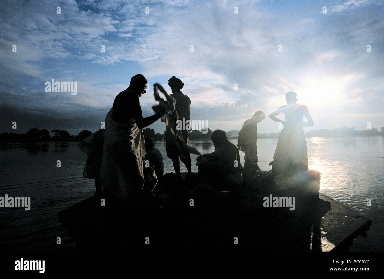 Bathers at sunrise at the Yamuna River, Mathura, India Stock Photo - Alamy