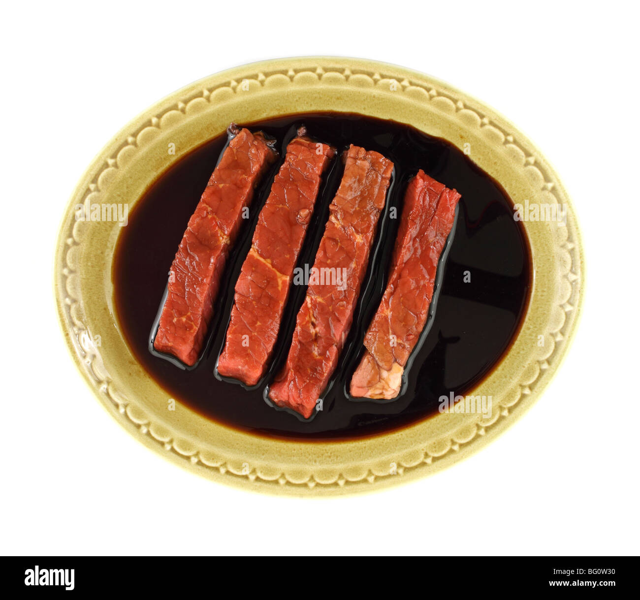 Marinated steak strips Stock Photo - Alamy