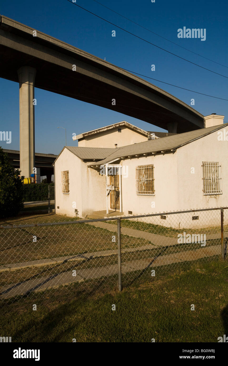 A house with the 105 Freeway towering above, Los Angeles, California ...