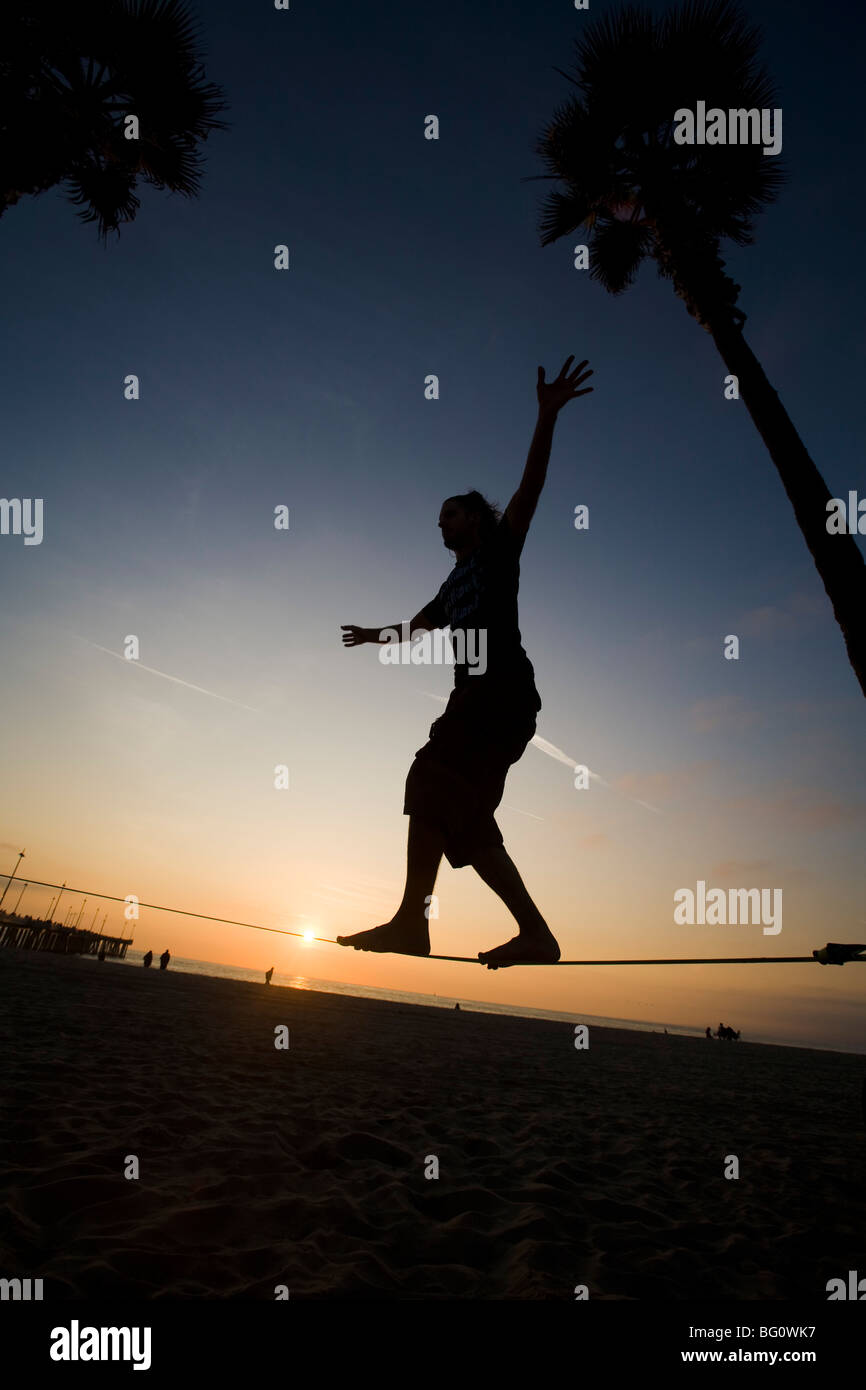 Slacklining - blanacing on a slackline - Venice Beach, Los Angeles ...