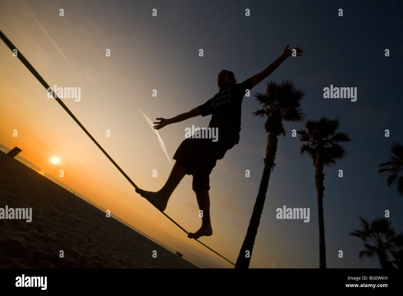 Slacklining - blanacing on a slackline - Venice Beach, Los Angeles ...