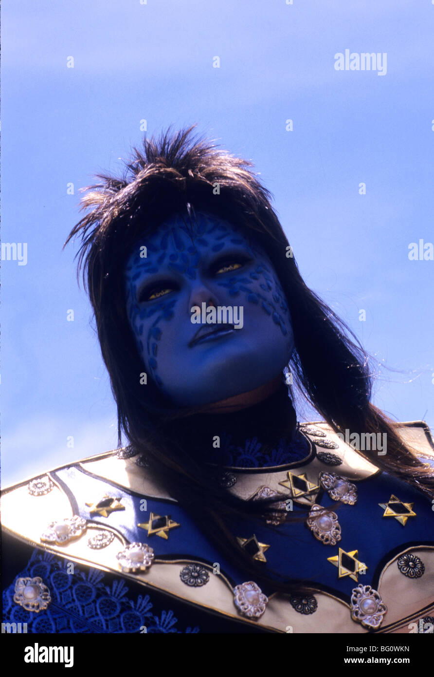 A member of one of the many dance groups that perform during the annual ...