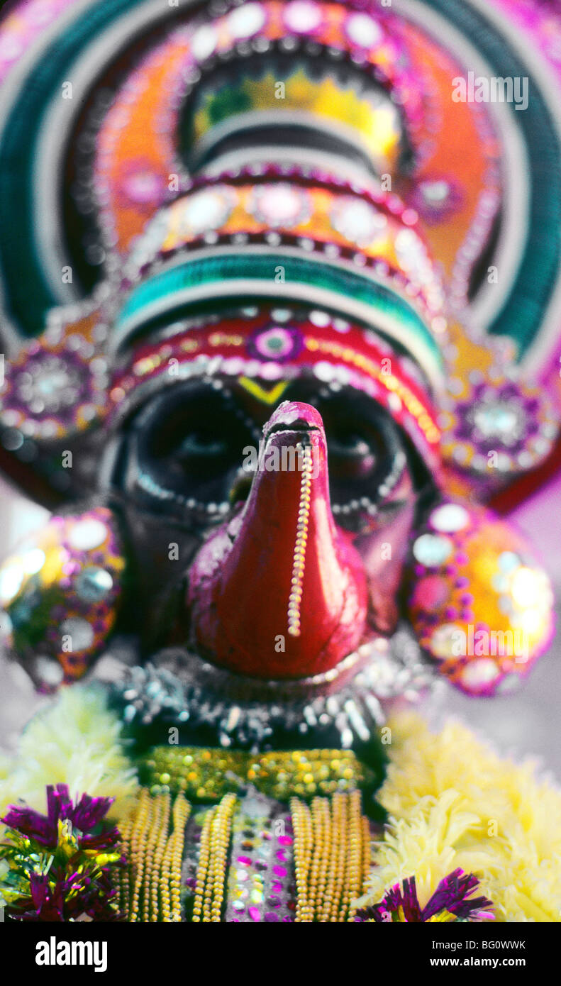 A traditional mask worn during a Hindu festival in Varkala in the state ...
