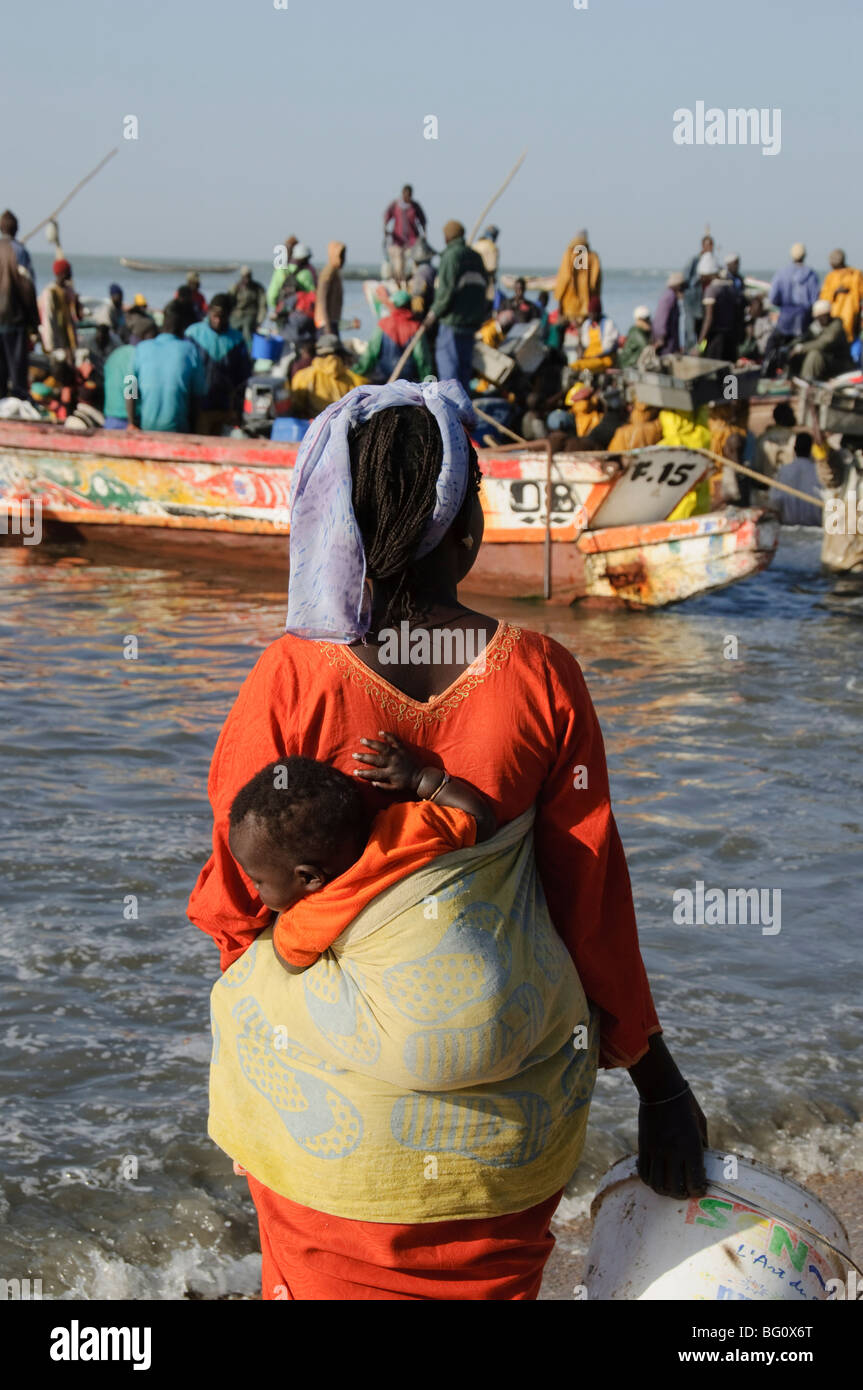 Unloading fishing boats (pirogues), Mbour Fish Market, Mbour, Senegal ...