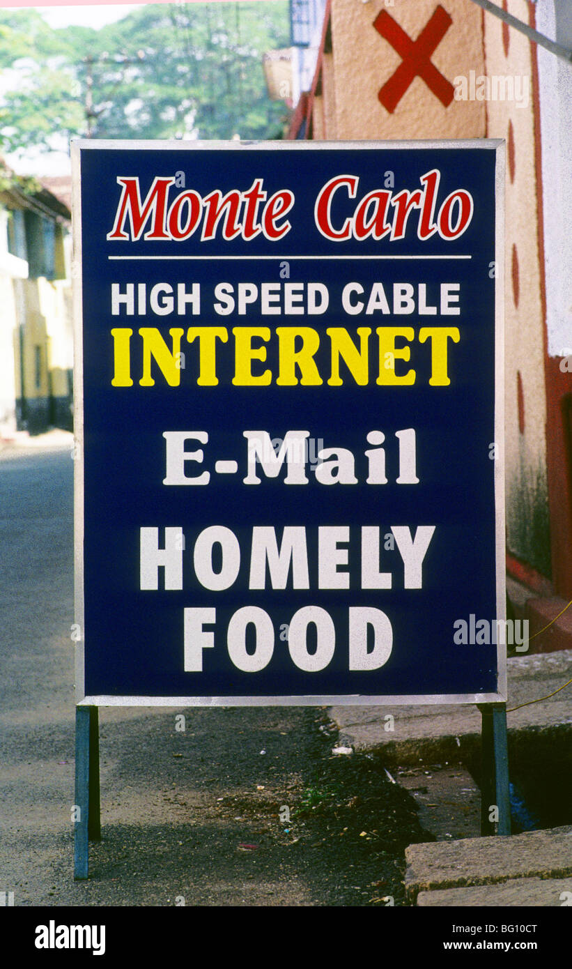 A sign advertising an internet cafe with Homely Food in Cochin, India ...