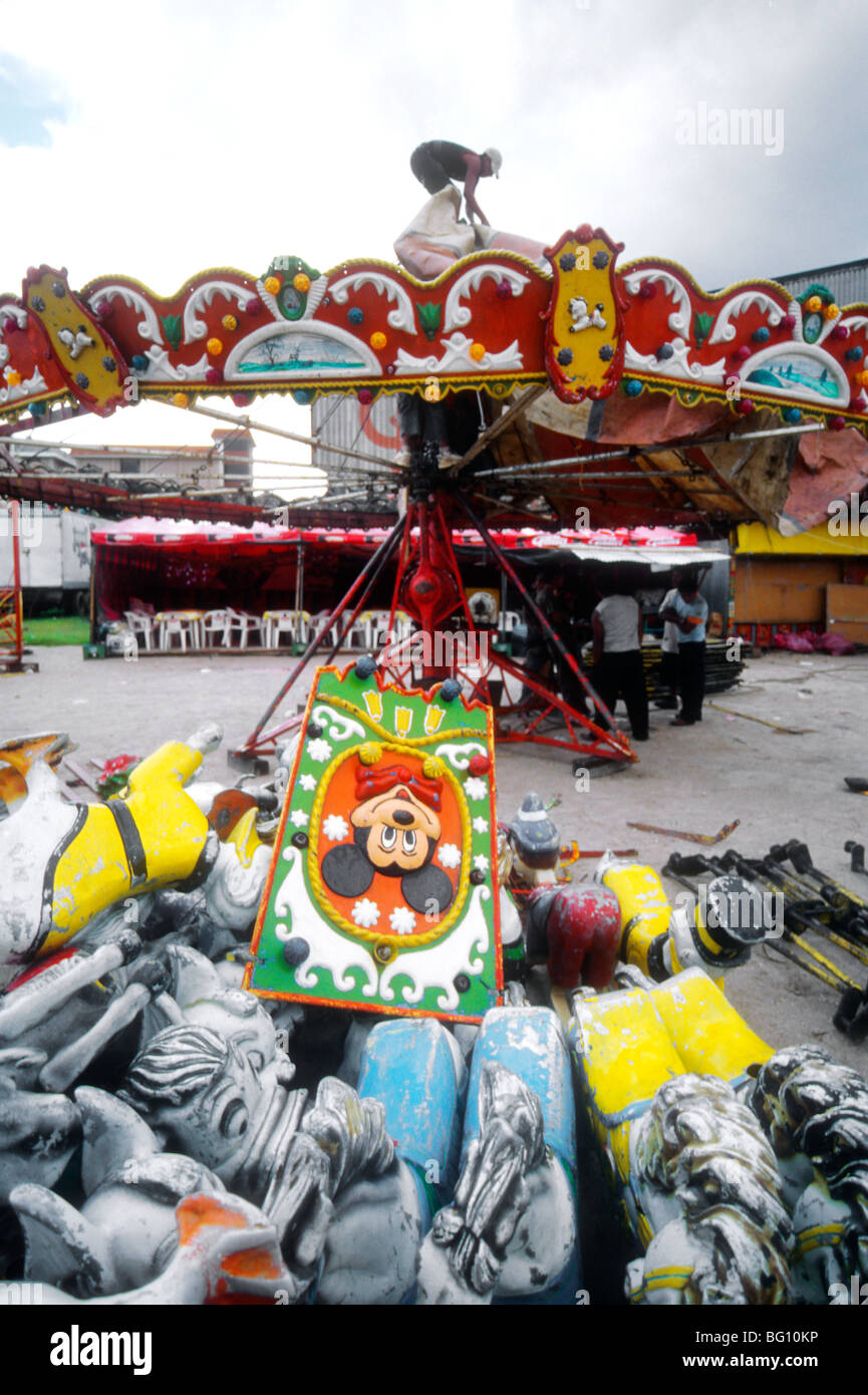 A carnival ride is being erected during the annual August festival in ...