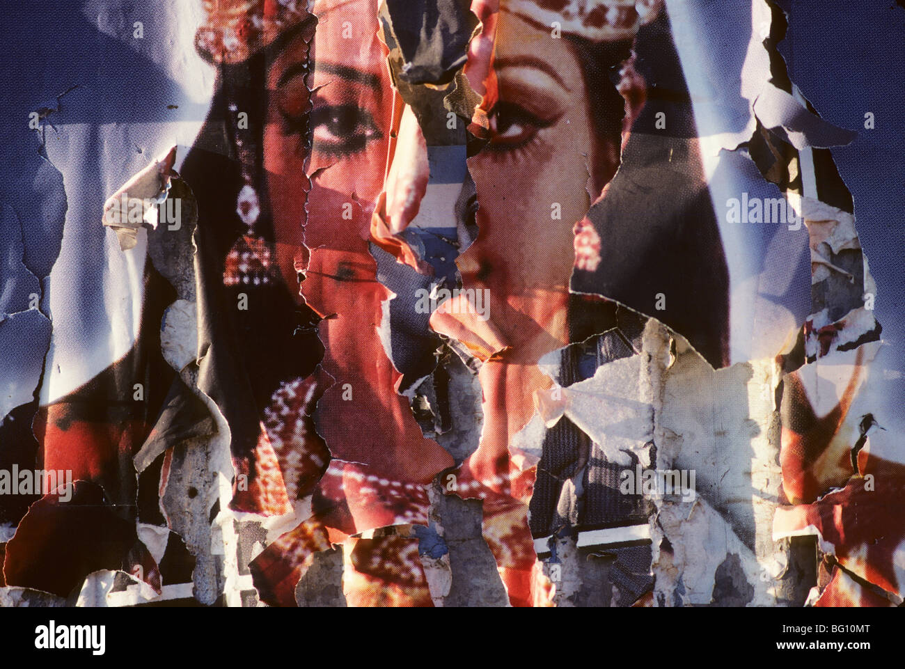 Torn movie posters overlap on a wall in Hospet, India Stock Photo - Alamy