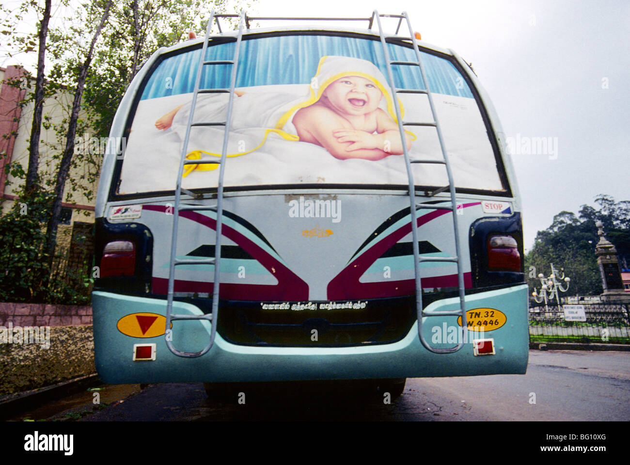 The back of a of a public bus with rear window art, Ooty, India Stock ...