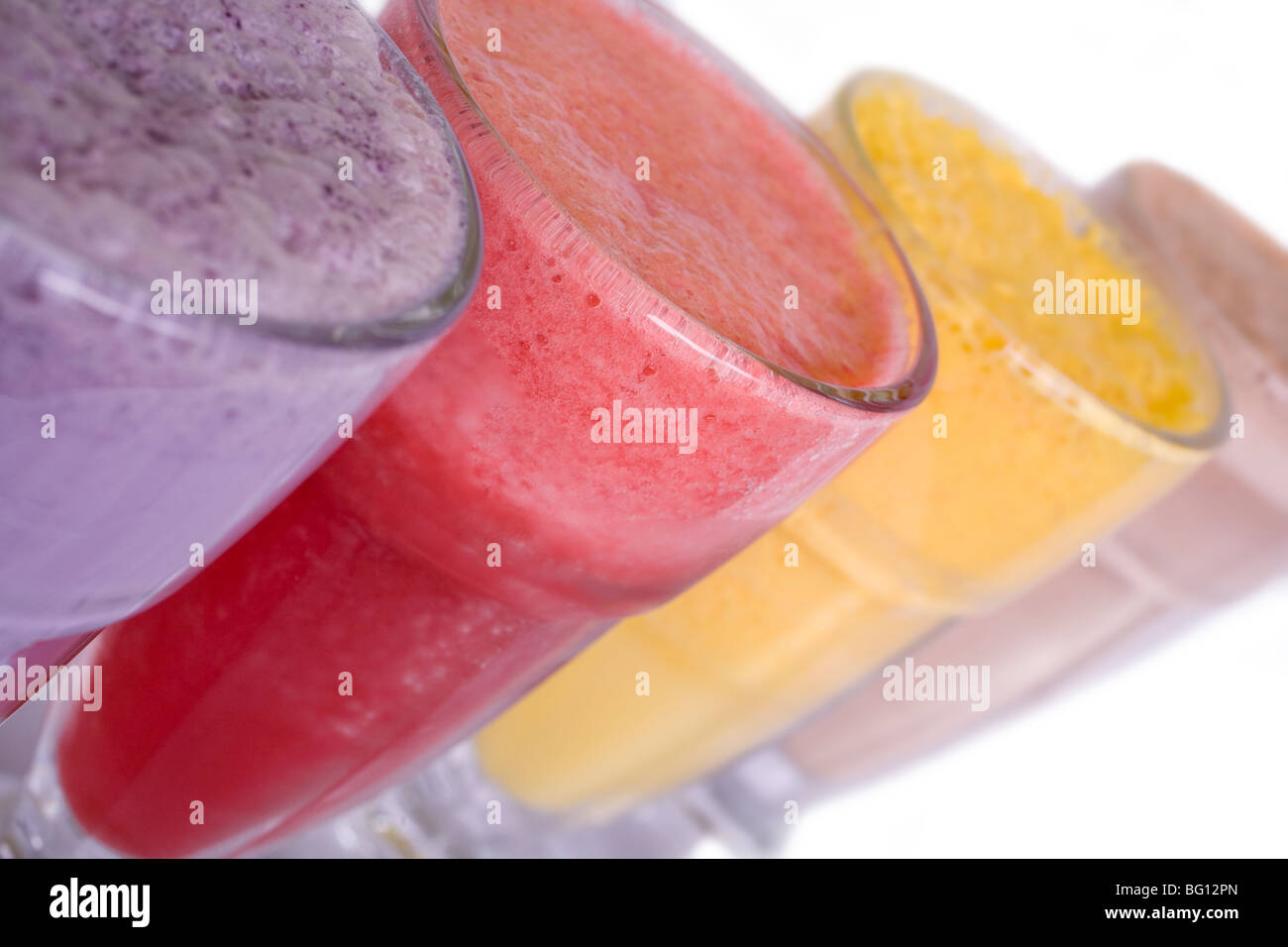 Four brightly coloured milkshakes - Mango, Chocolate, Raspberry and ...