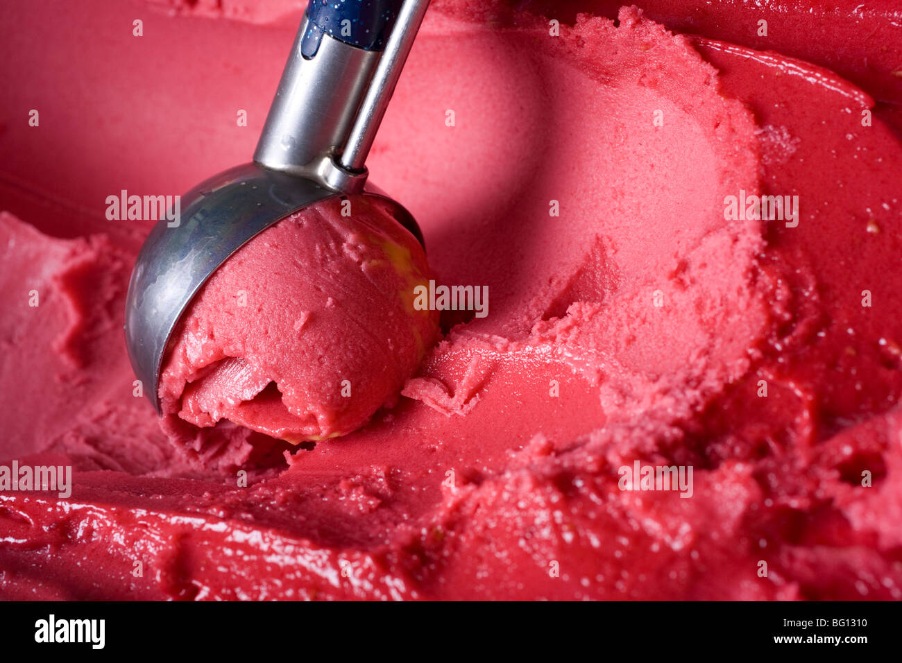 Delicious ice-cream being scooped out Stock Photo - Alamy