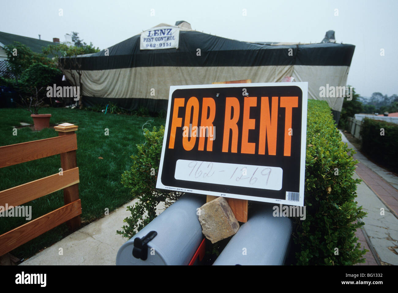 A house for rent that is being tented for bugs Stock Photo - Alamy