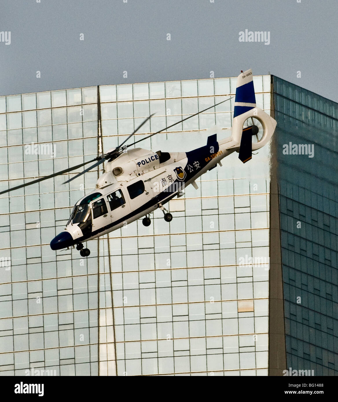 A police helicopter flying in front of one of Nanjing's newest ...