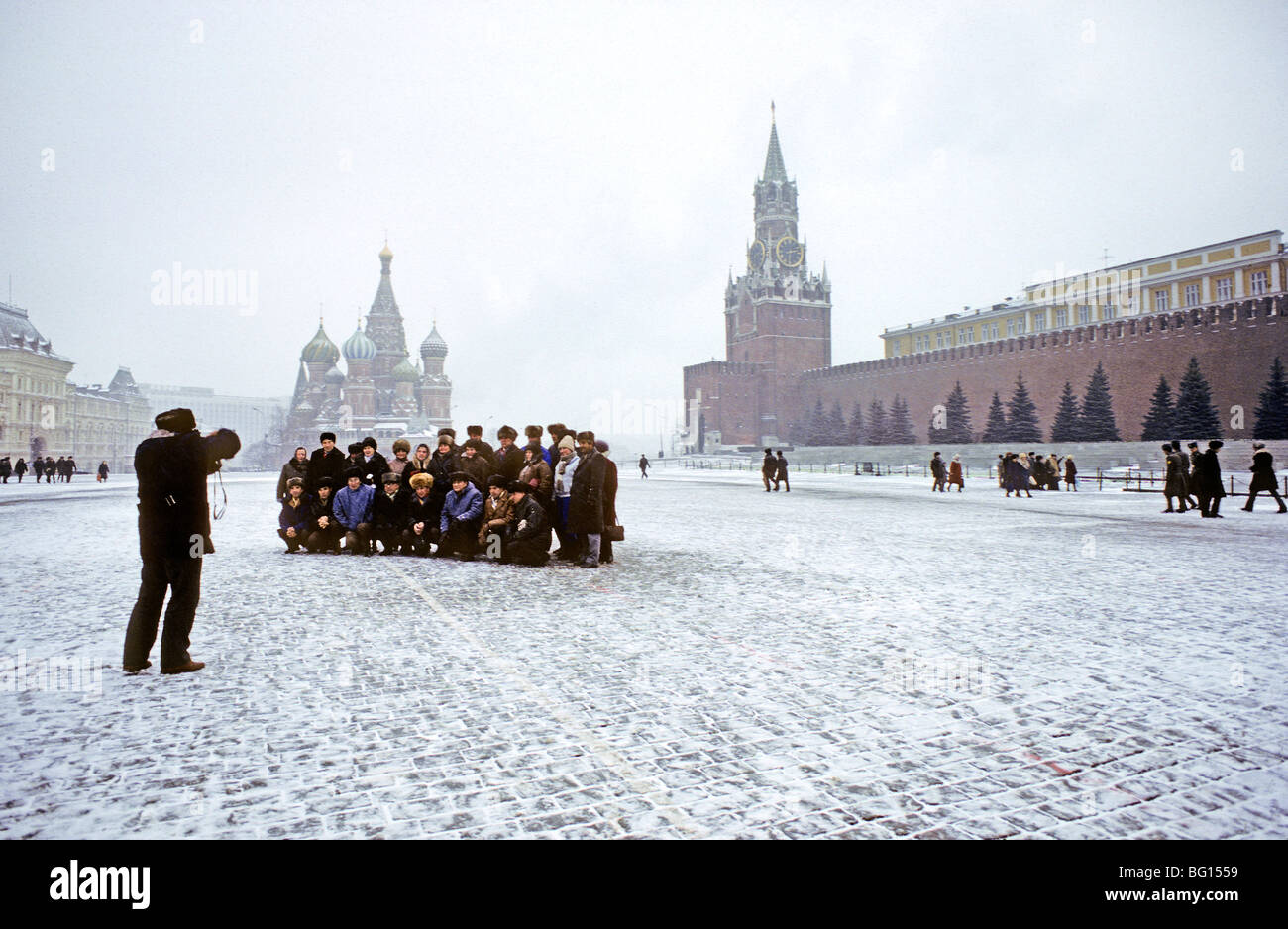 A Russian tour group gets their picture taken in Red Square in Moscow ...