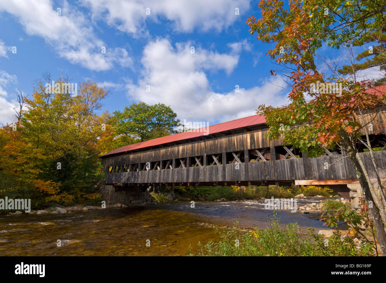 Traditional covered bridge over the Swift River, Albany near North ...