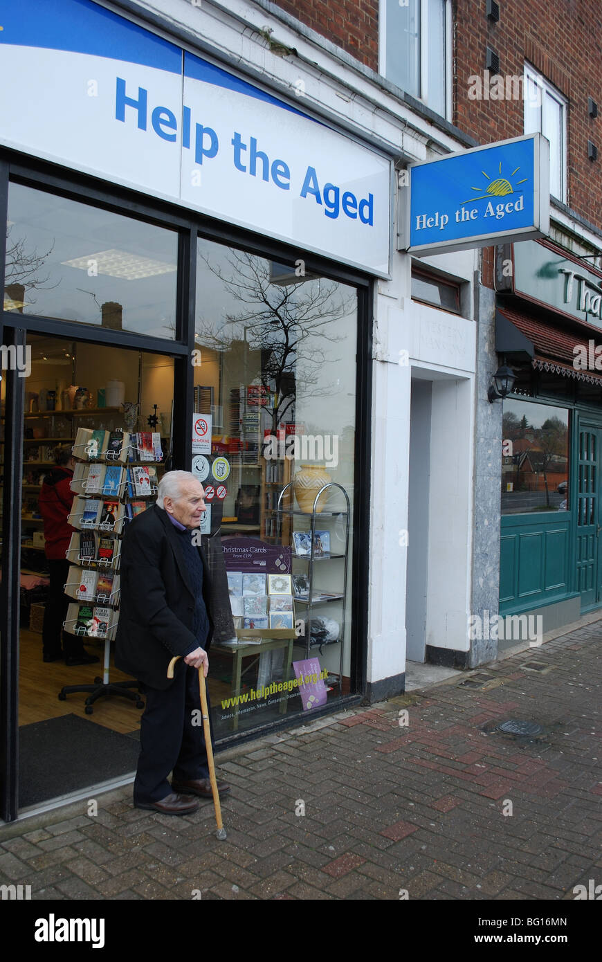 An old man with stick in a front of the shop in Barnet Stock Photo - Alamy