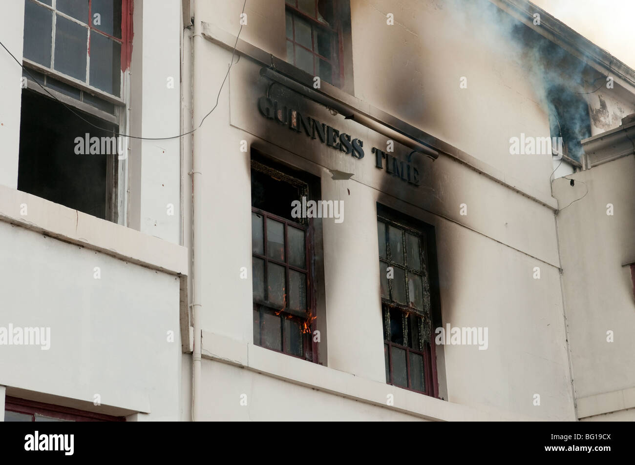 Pub on fire with fire and smoke from windows Stock Photo - Alamy