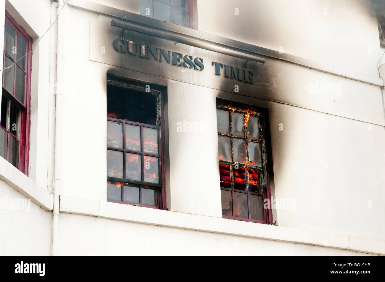 Pub on fire flames from windows Stock Photo - Alamy