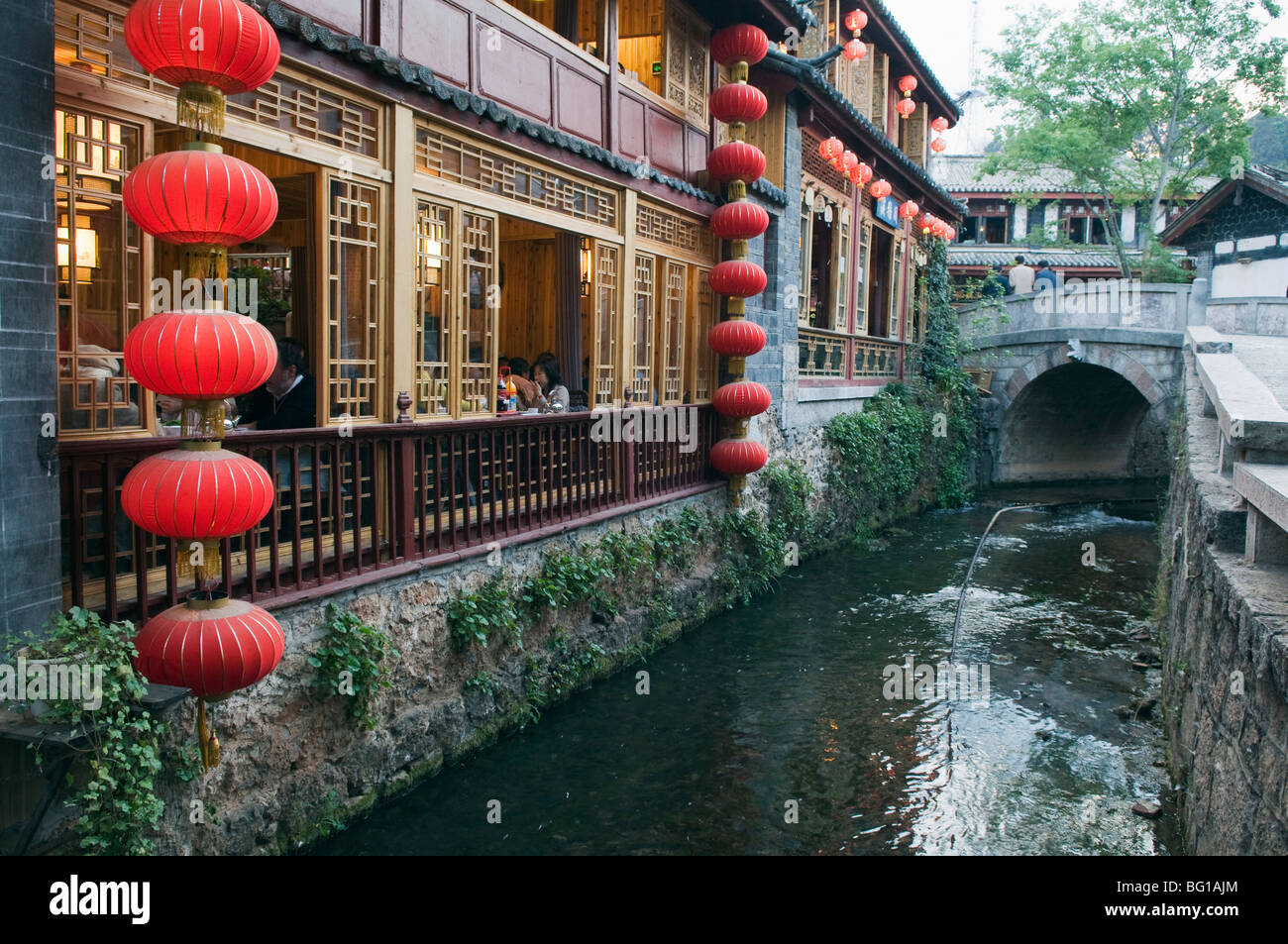 Traditional architecture of riverside restaurant in Lijiang Old Town ...