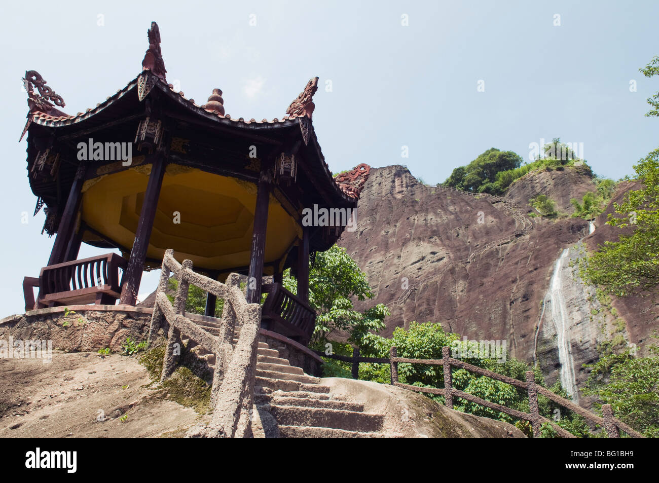 Pavilion and waterfall at Tianyou Feng Heavenly Tour Peak in Mount Wuyi ...