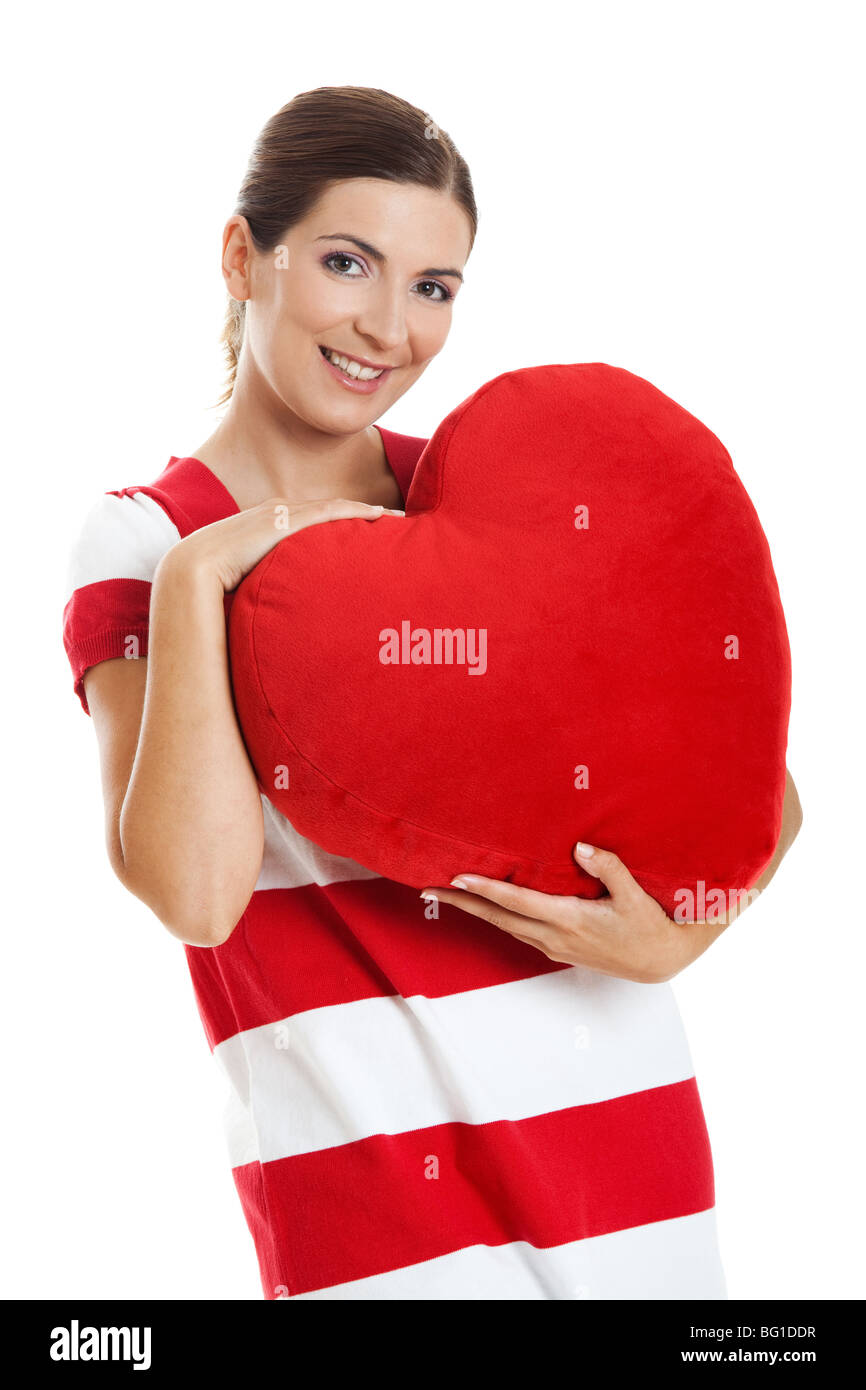 Beautiful woman holding a red heart, isolated on white background Stock ...